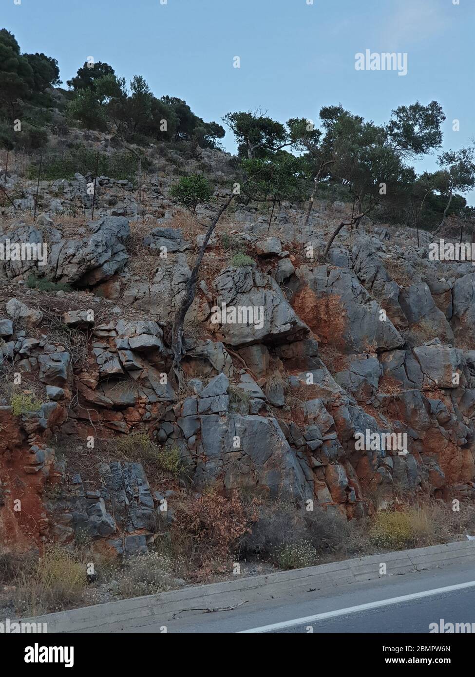 Crete road and mountains, evening sunset in mountain Stock Photo - Alamy