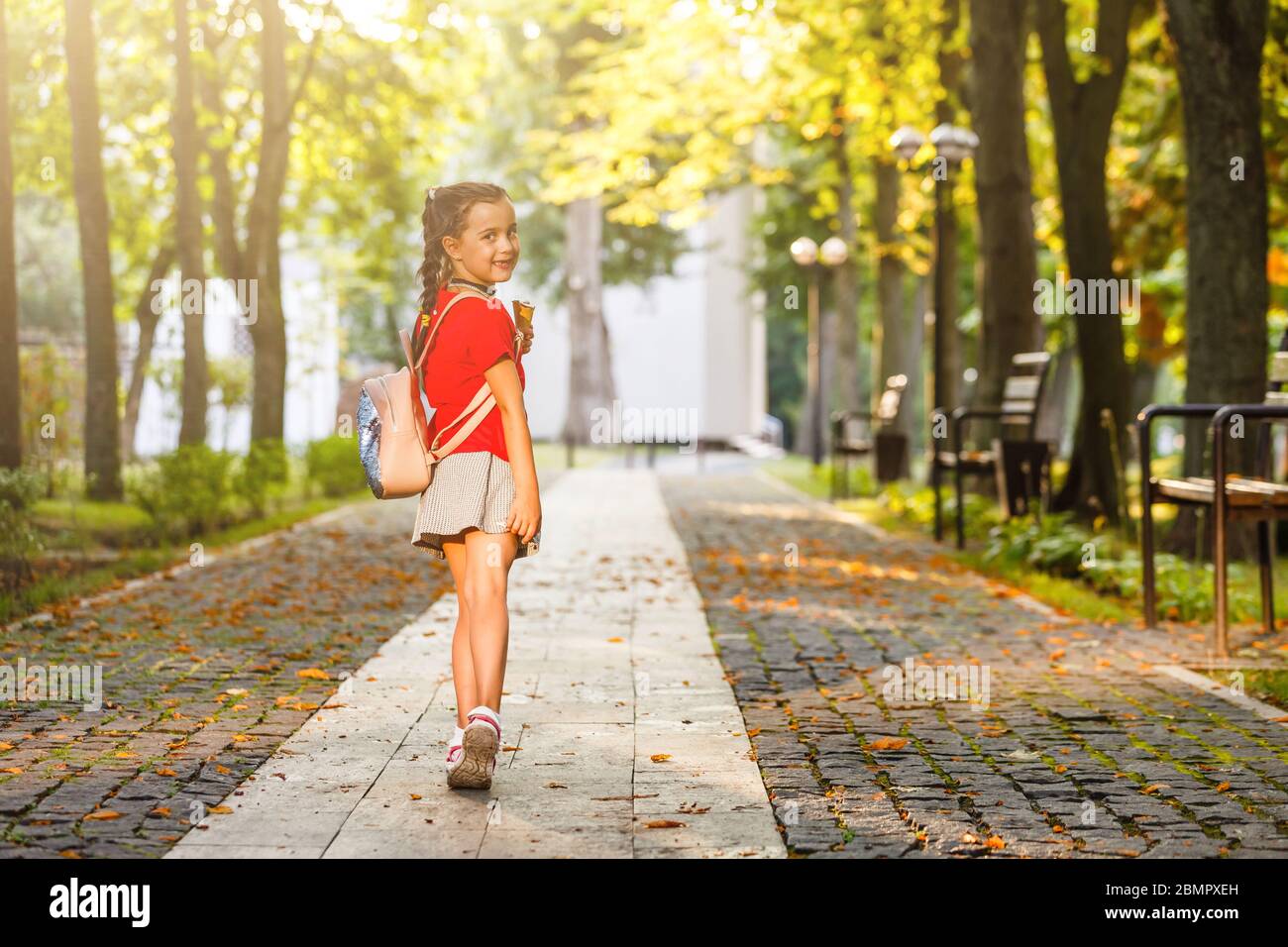 schoolgirl going to school alone Stock Photo - Alamy