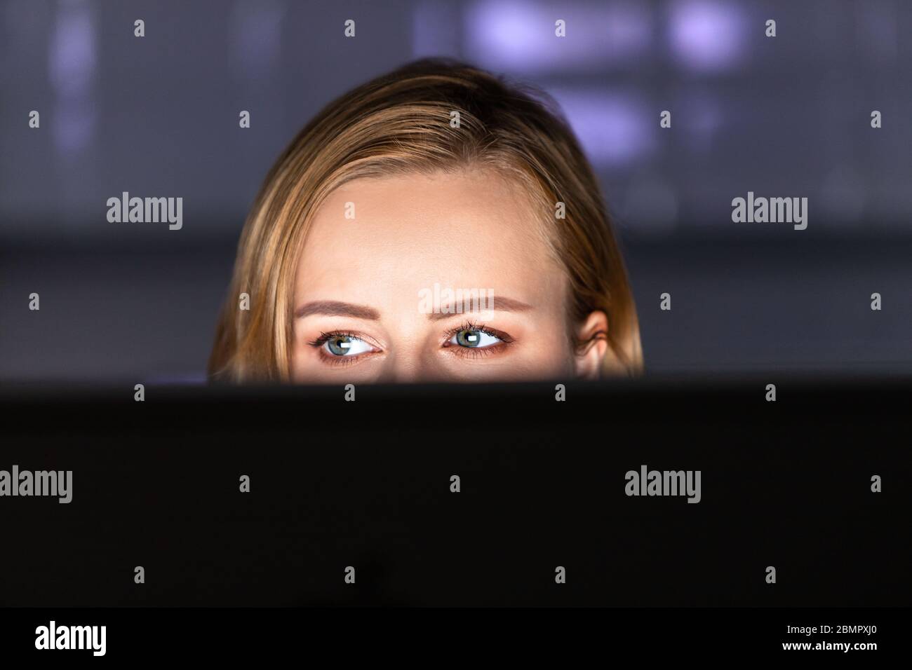 Female office worker working late hi-res stock photography and images ...