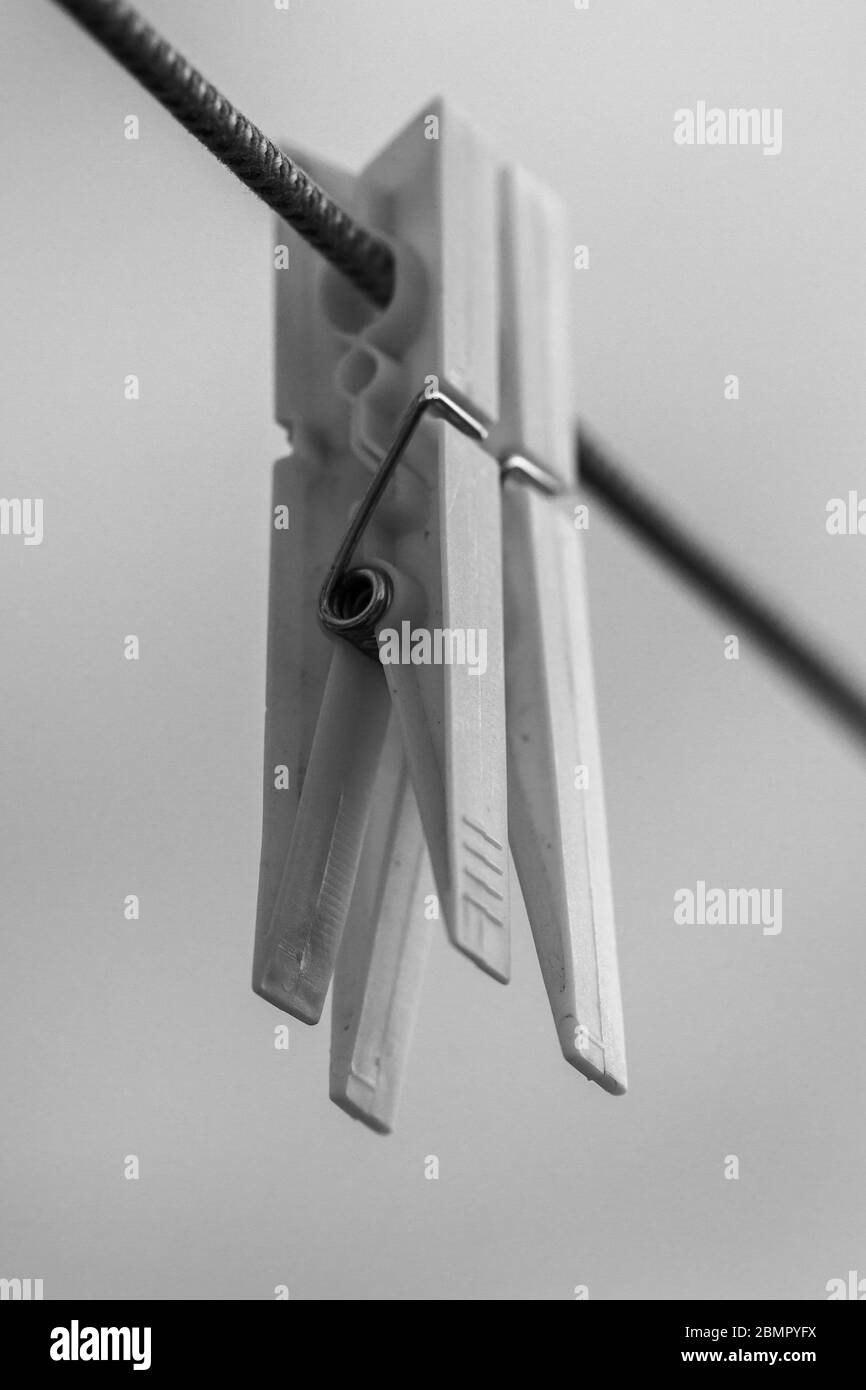 Blue clothes pegs Black and White Stock Photos & Images - Alamy