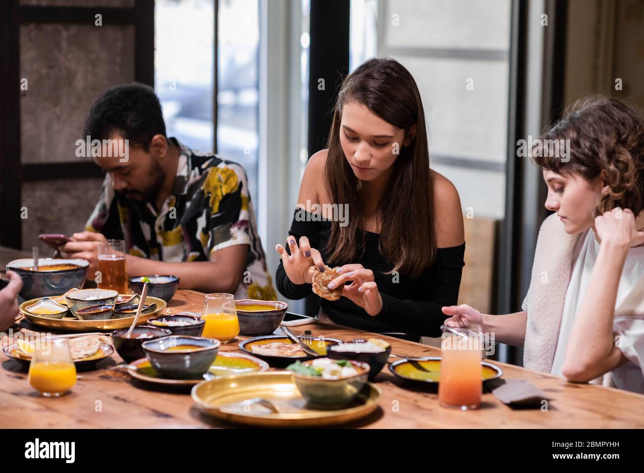 Multicultural students lunch school hi-res stock photography and images ...