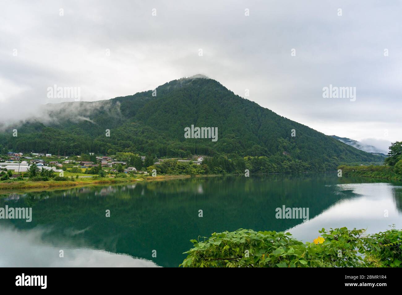 Japanese countryside landscape with rural village and river in the ...