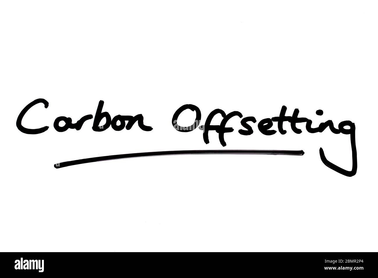 Carbon Offsetting handwritten on a white background Stock Photo - Alamy