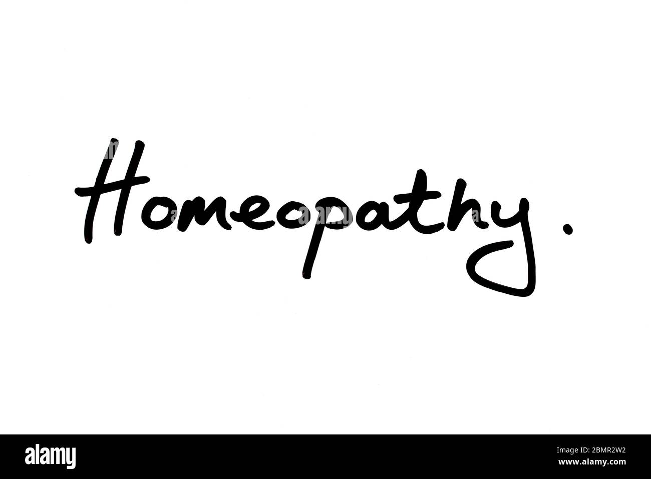 Homeopathy handwritten on a white background Stock Photo - Alamy