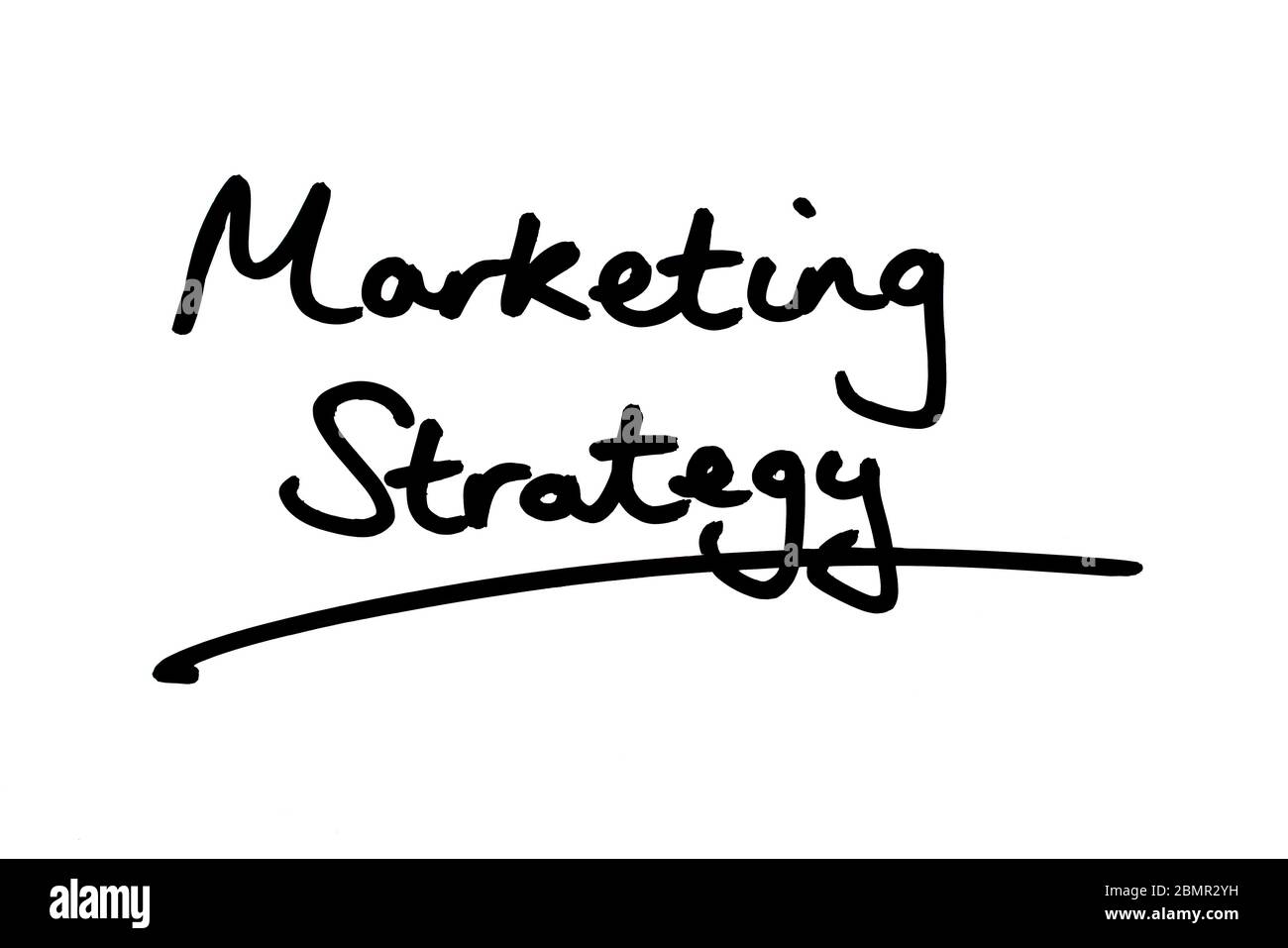Marketing Strategy handwritten on a white background Stock Photo - Alamy