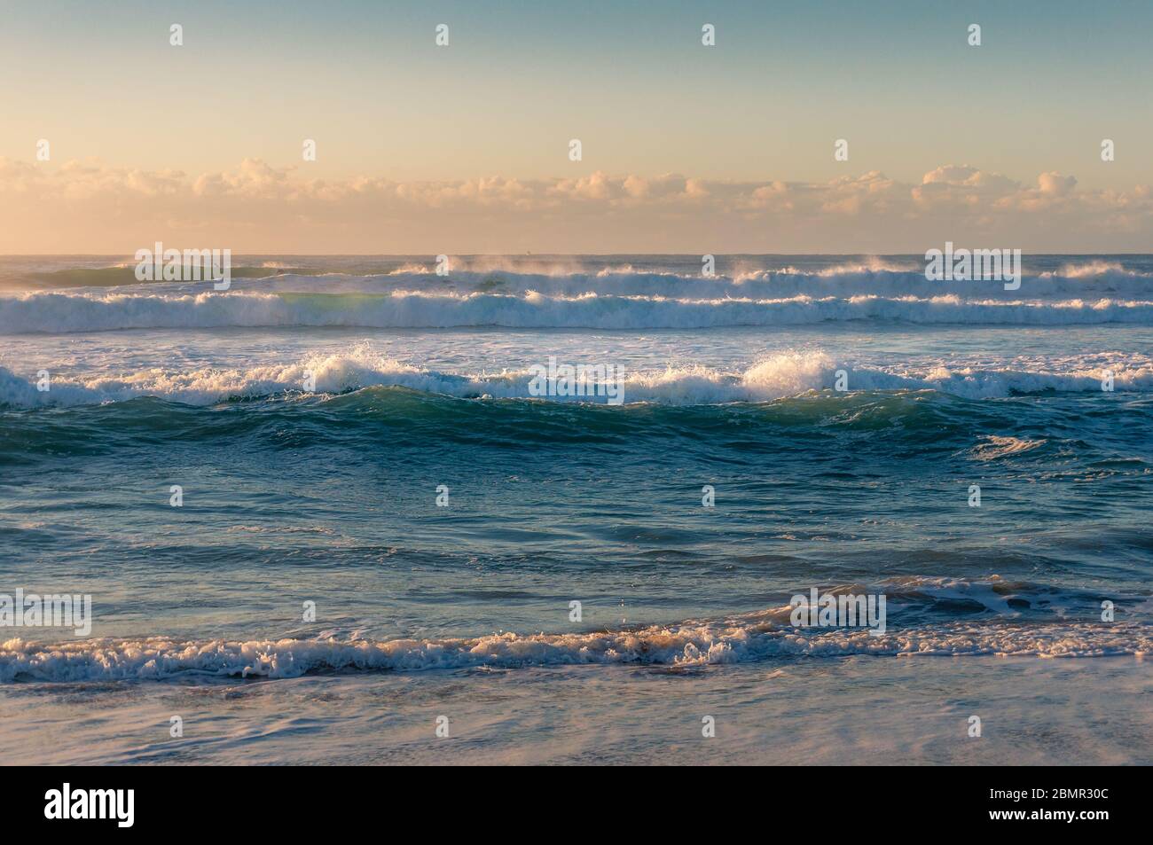 Seascape with beautiful waves at sunrise. Summer beach vacation surf ...