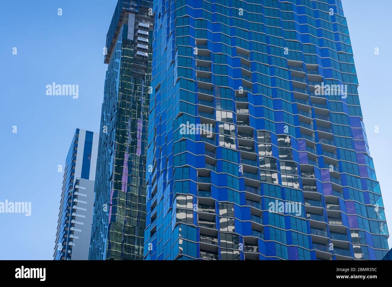 Modern skyscraper wall texture with shiny glass windows and glossy ...