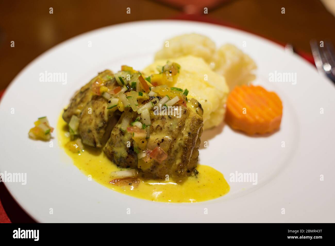 Rice with vegetables and fish meal. White steamed rice served with fish ...