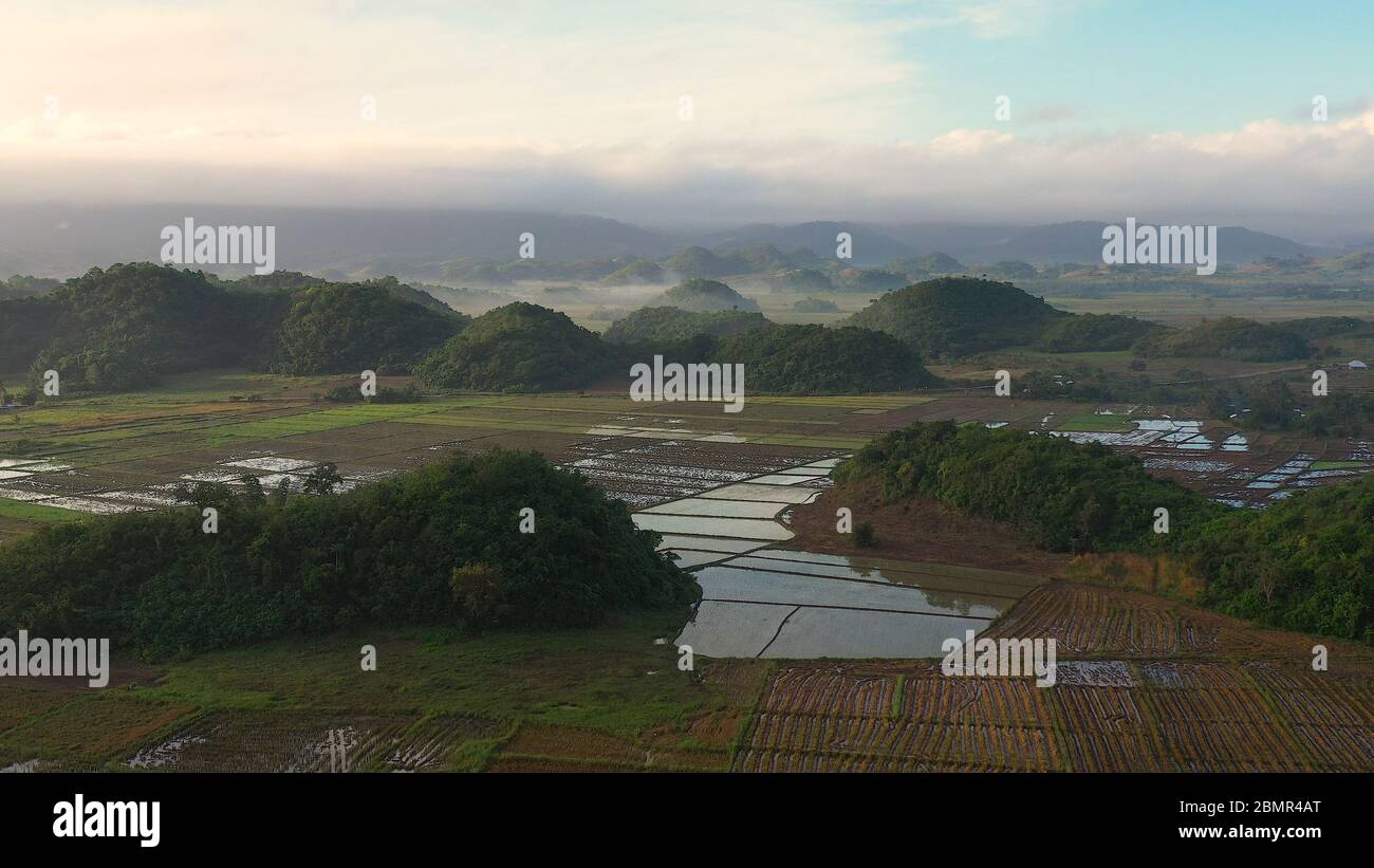 Landscape with farmland and green hills, aerial view. The nature of ...