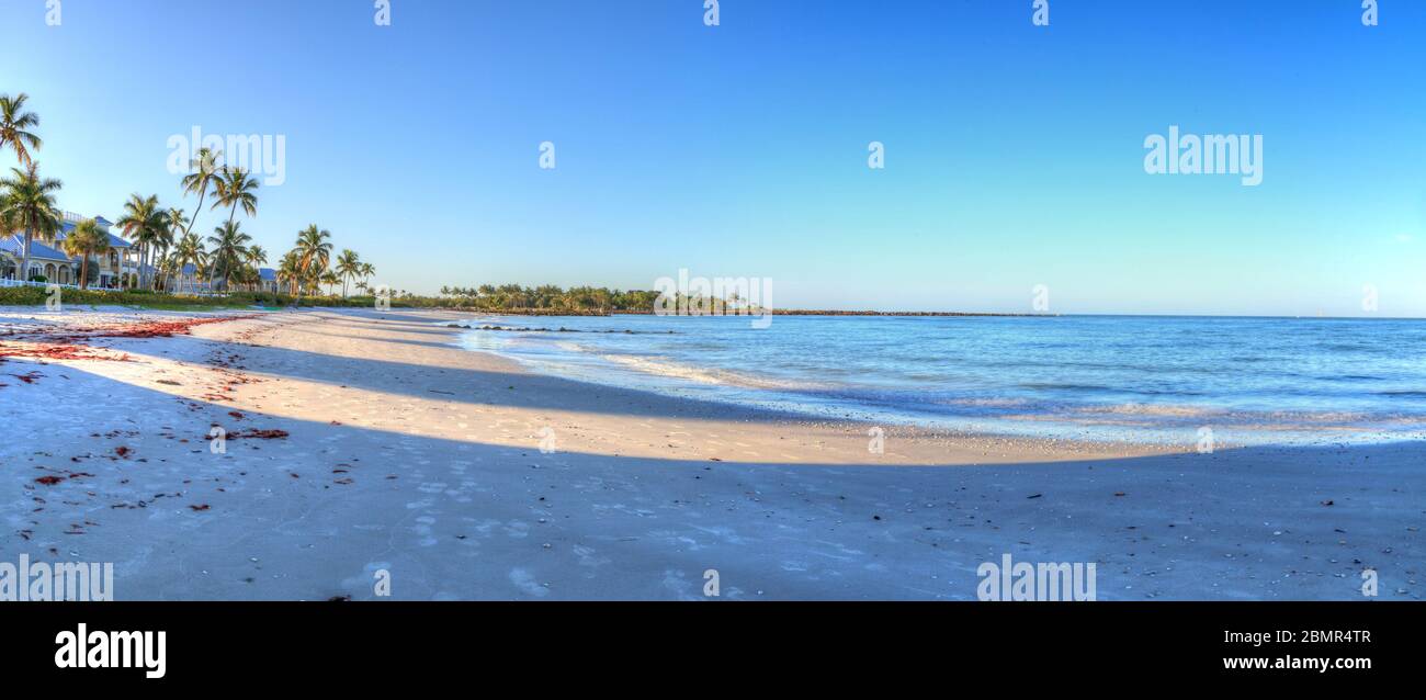 Shoreline of Port Royal Beach at sunrise in Naples, Florida Stock Photo ...
