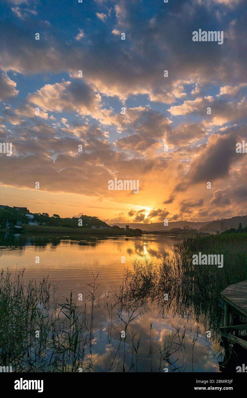 River sunset landscape with beautiful clouds and water reflection Stock ...