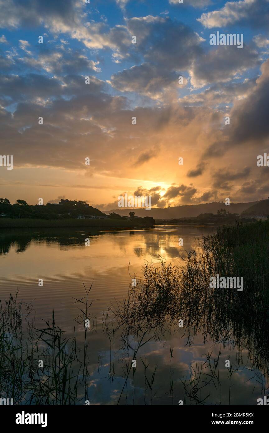 River sunset landscape with beautiful clouds and water reflection Stock ...