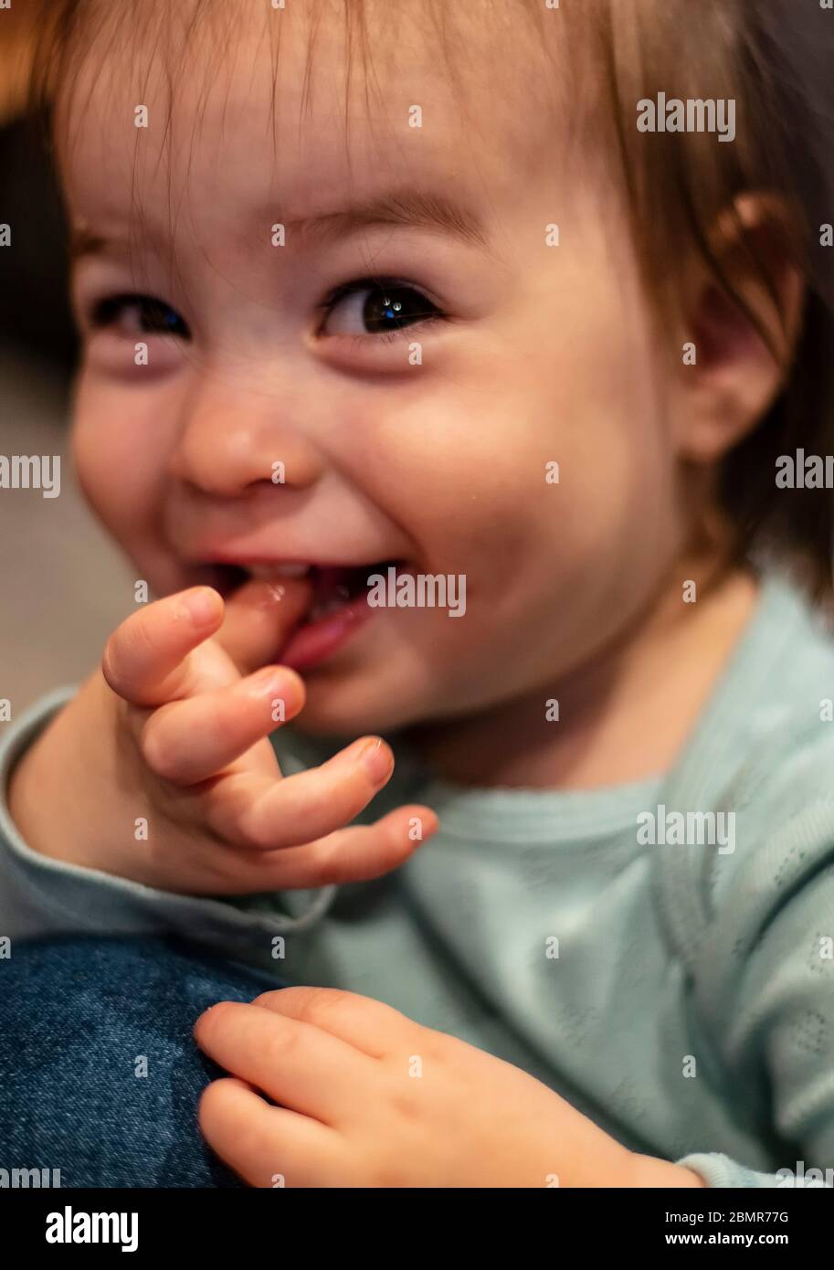 Young girl with a sweet smile Stock Photo - Alamy