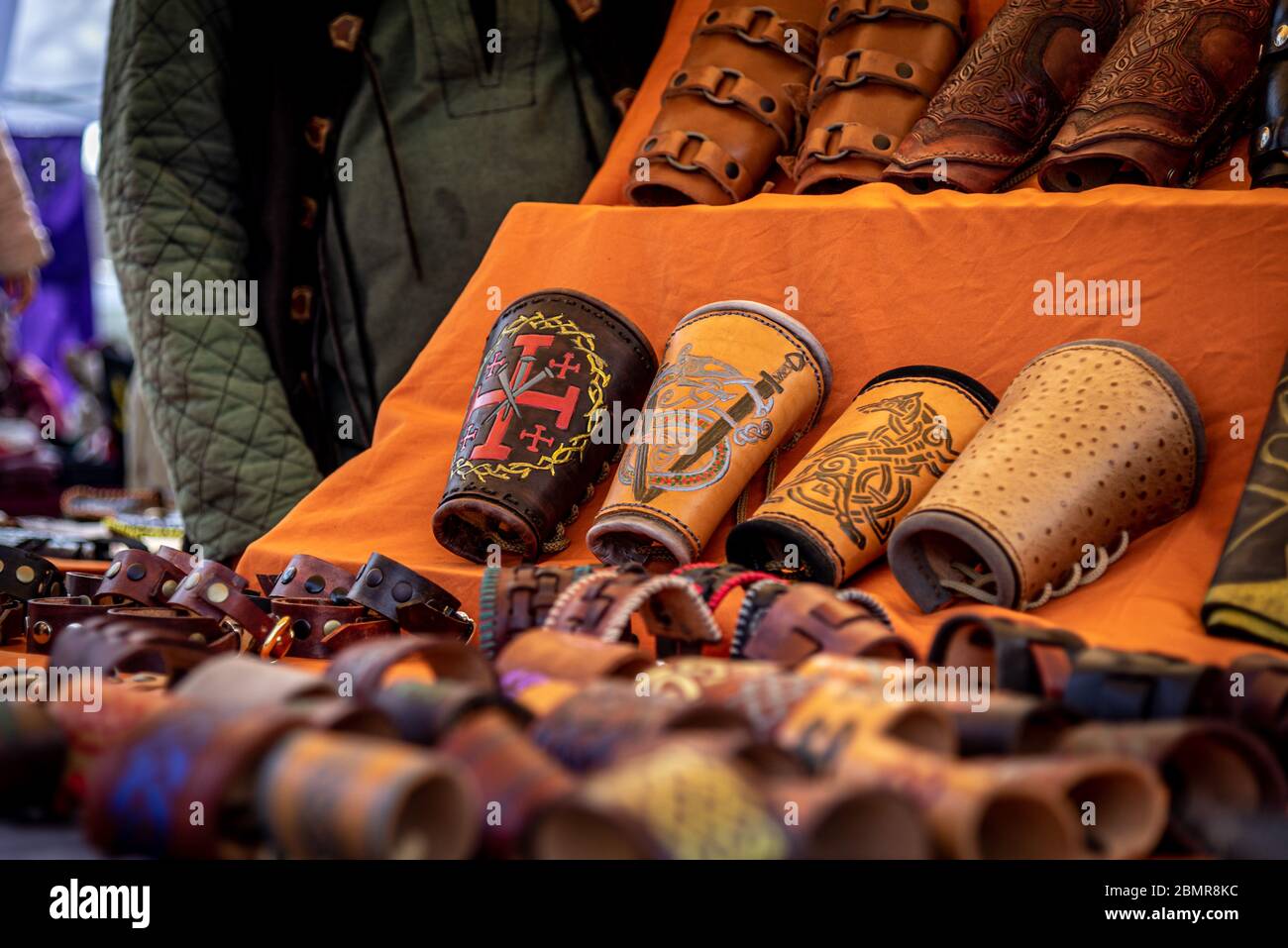 Sales stand with engraved leather bracers of medieval age Stock Photo ...