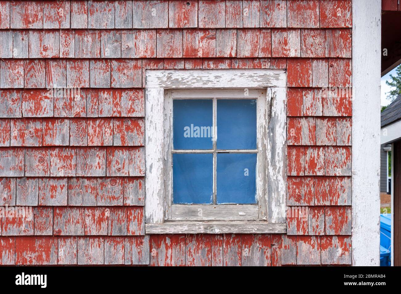 Quaint fisherman's shack, by the dock. Façade details with small window ...