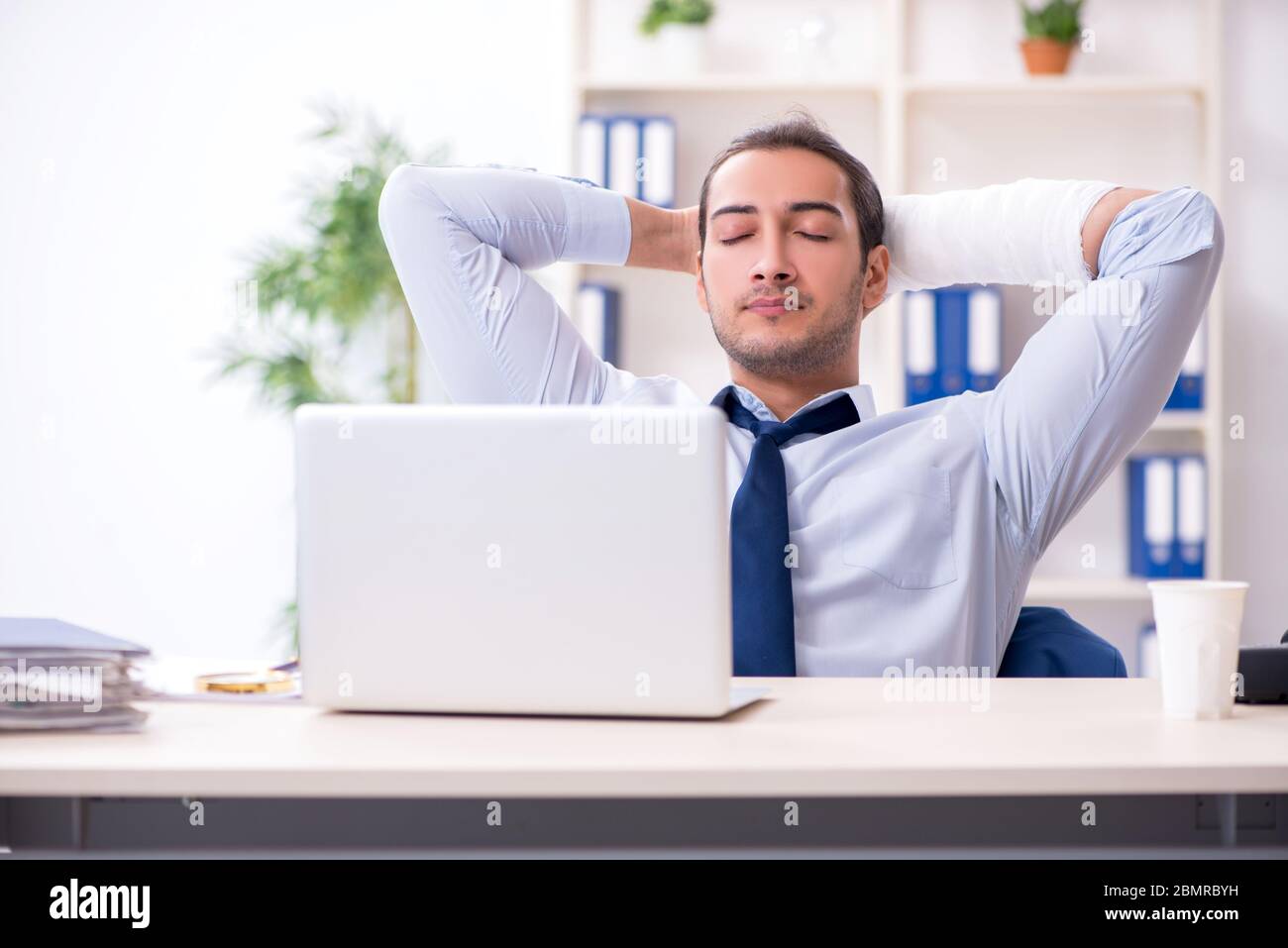 Injured arm resting hi-res stock photography and images - Alamy