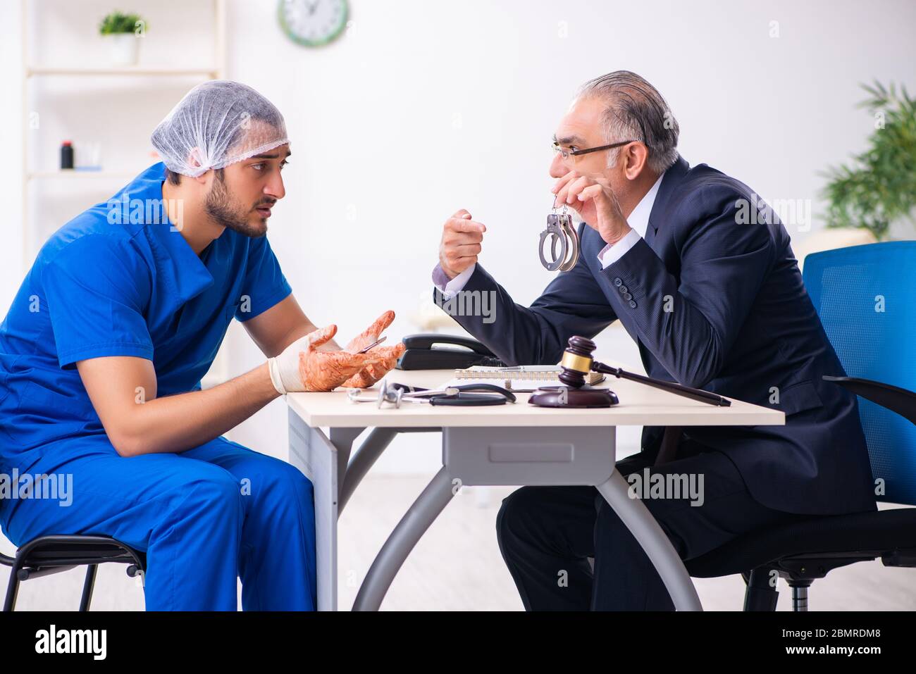 Doctor in courthouse meeting with advocate Stock Photo - Alamy