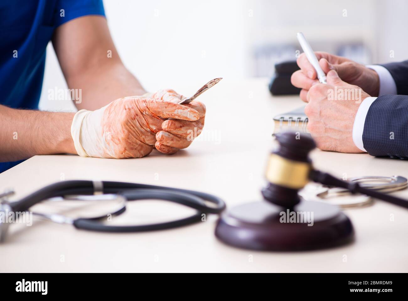 Doctor in courthouse meeting with advocate Stock Photo - Alamy