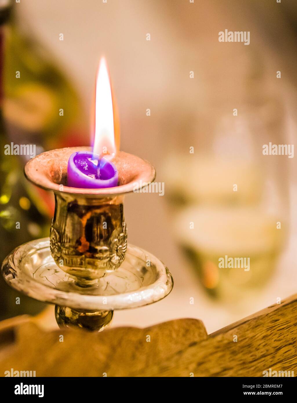 candle light illuminates the banquet table and gives the right ...