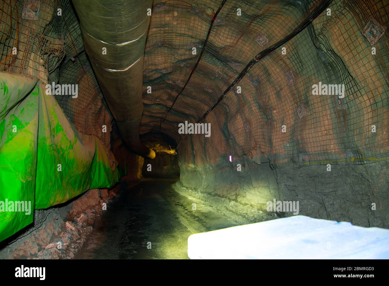 Underground Mining Tunnel with Support Mesh Stock Photo - Alamy