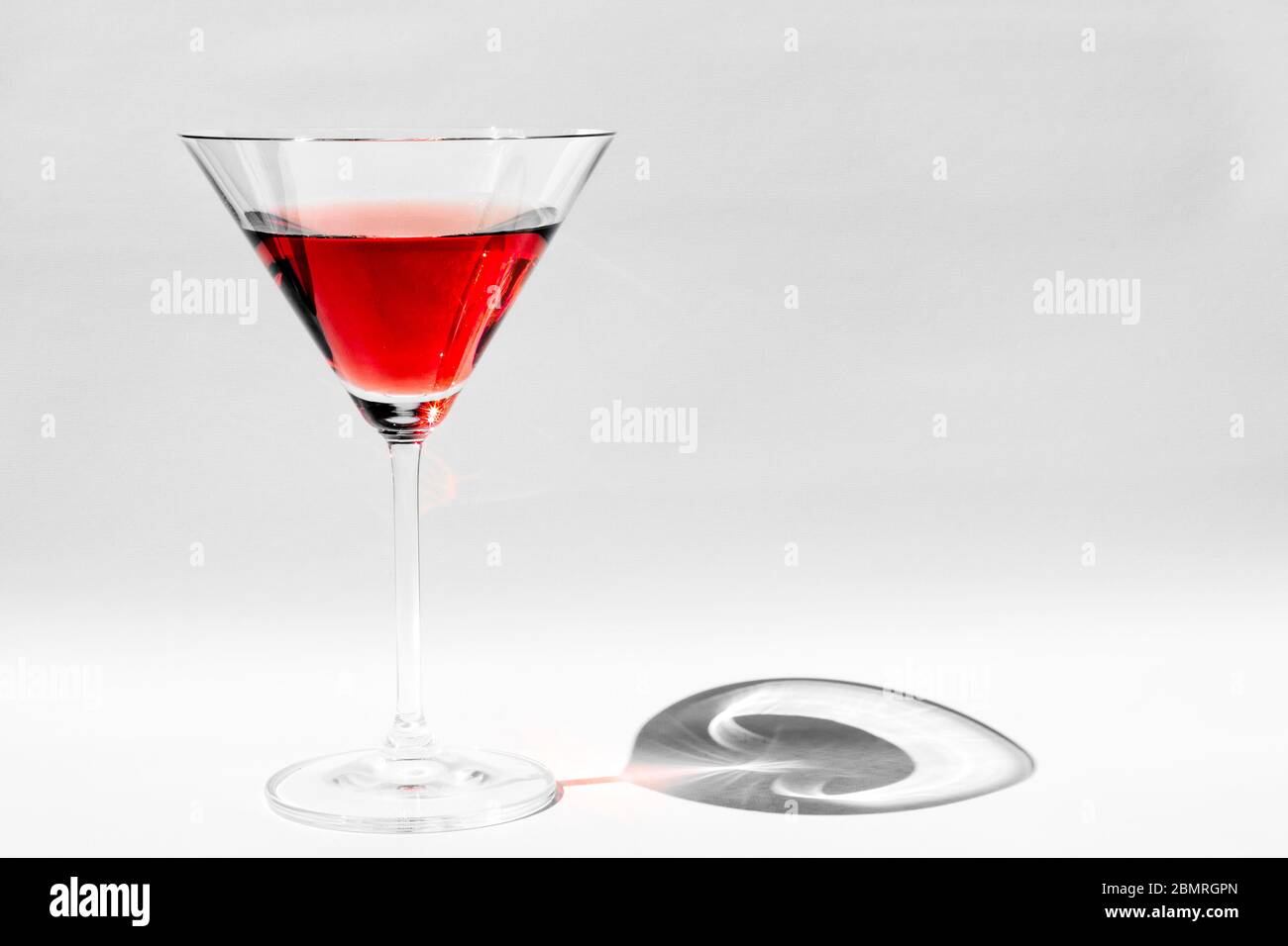 Rainbow of multiple bright color drinks in crystal clear martini ...