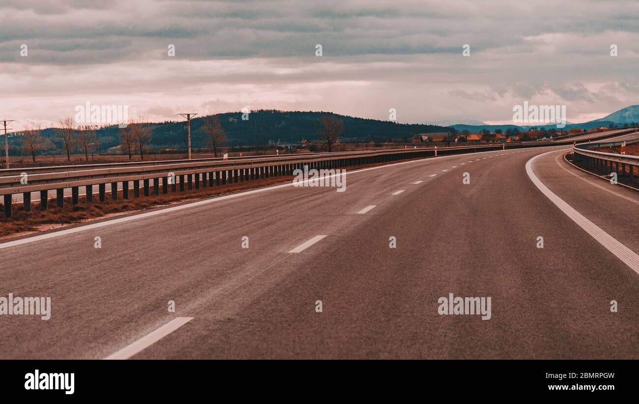 Empty track outside city with fields and road marking 2020 Stock Photo ...