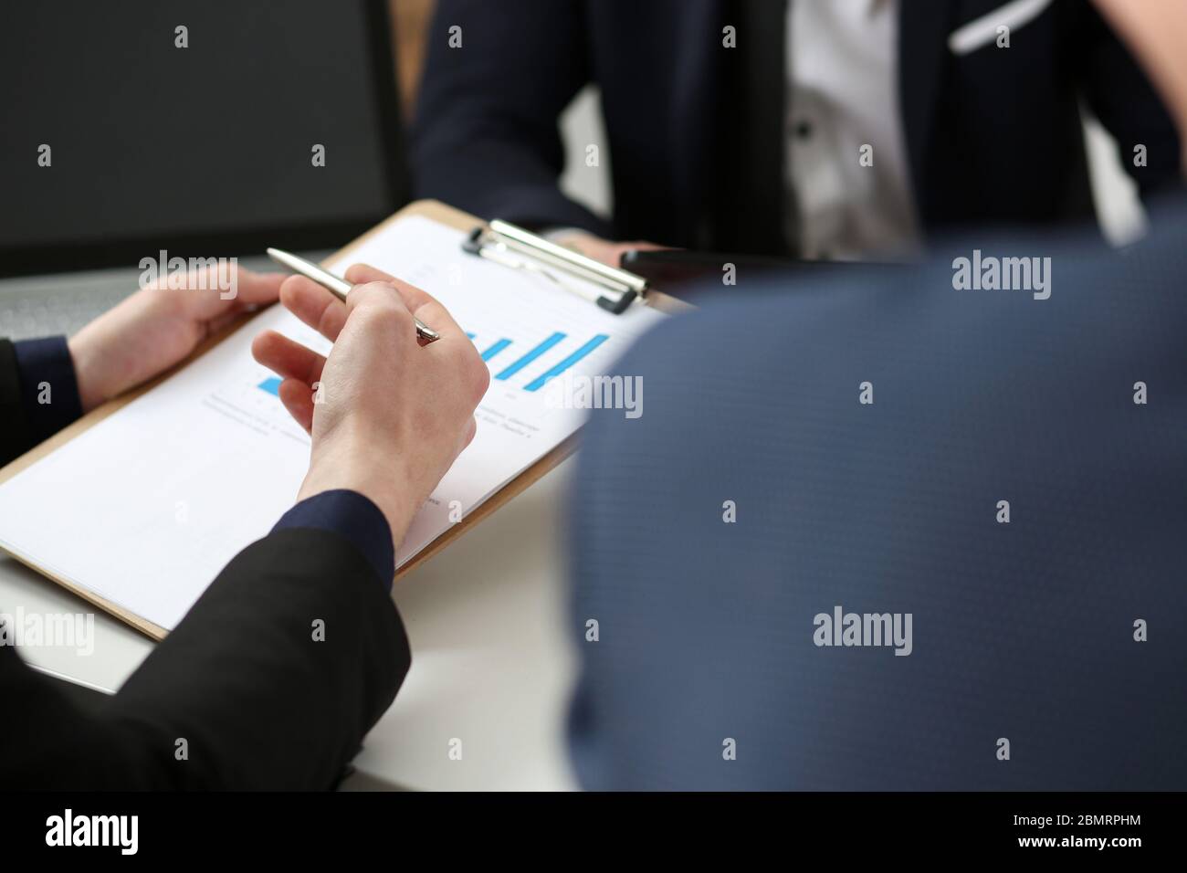 Group of people deliberate on problem Stock Photo - Alamy