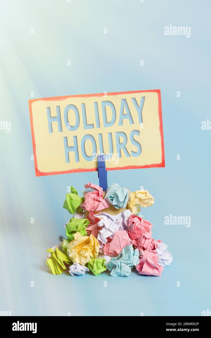 Text sign showing Holiday Hours. Business photo text Schedule 24 or7 ...