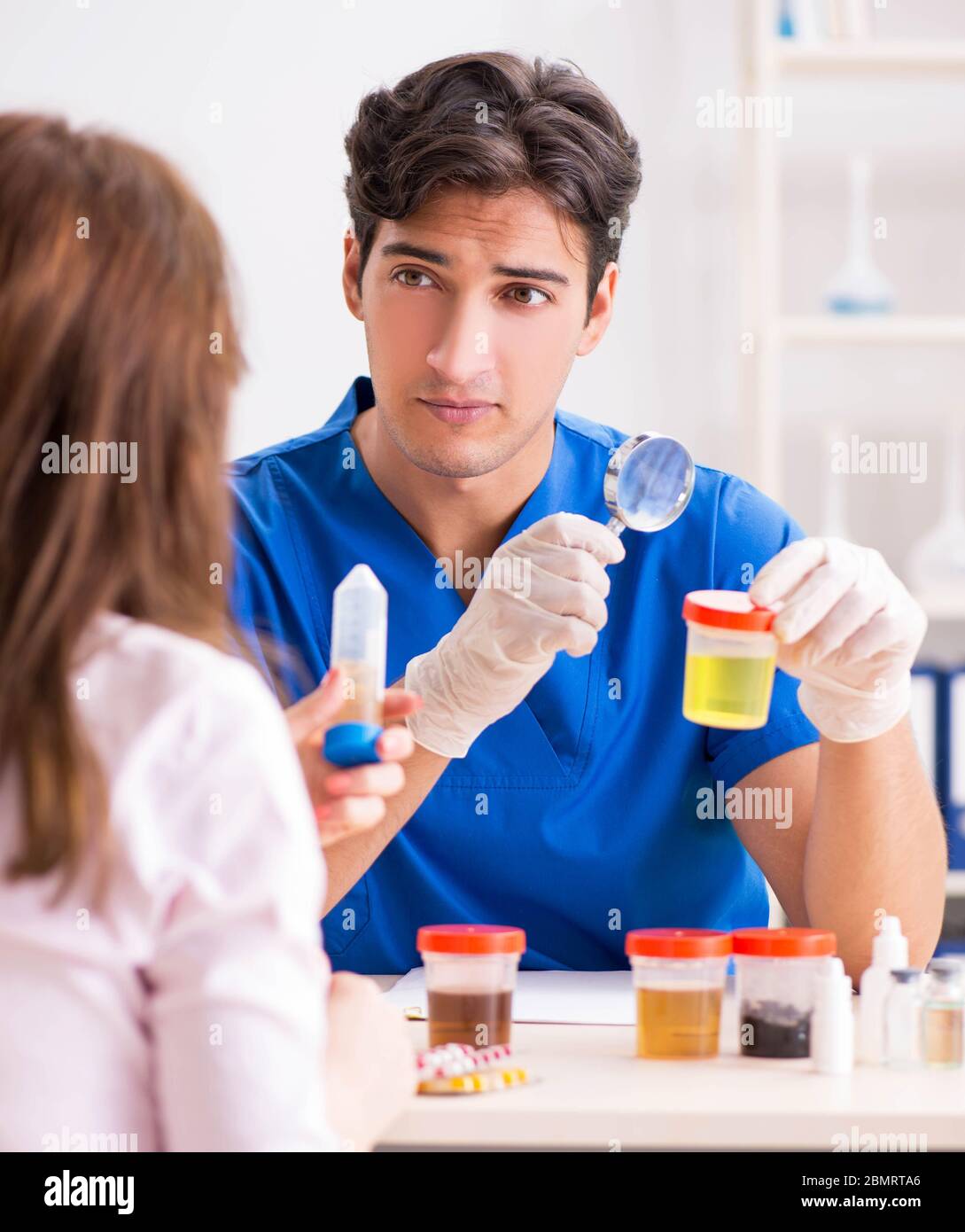 The patient visiting doctor for urine test Stock Photo - Alamy