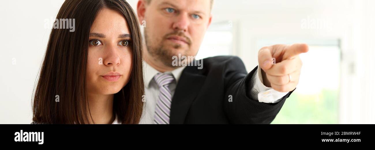 Angry yelling boss point arm to exit Stock Photo - Alamy