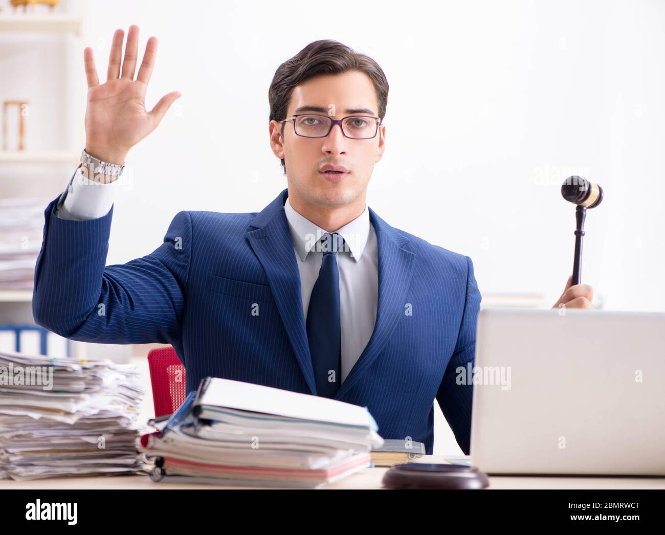 The young handsome judge working in court Stock Photo - Alamy