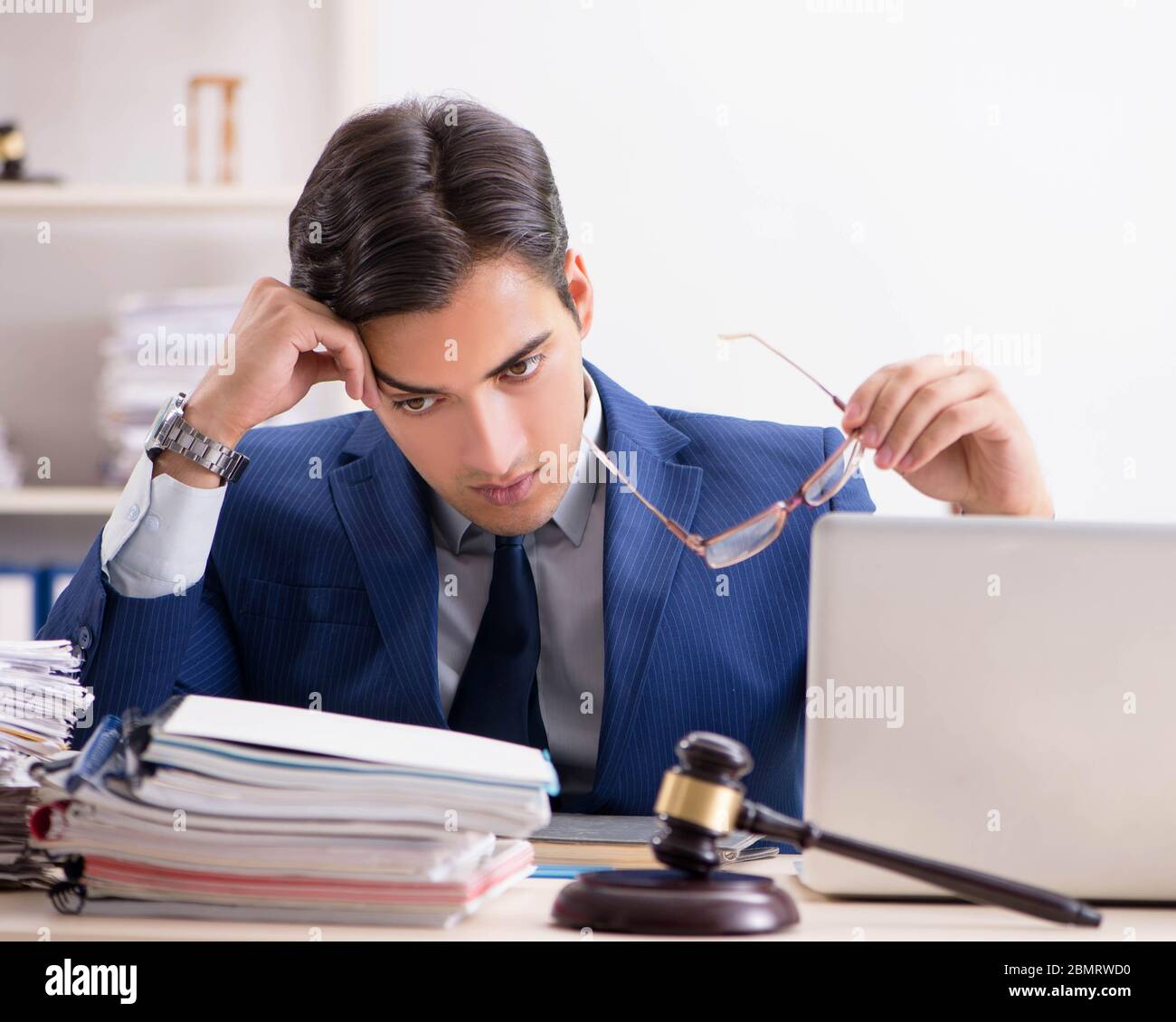 The young handsome judge working in court Stock Photo - Alamy