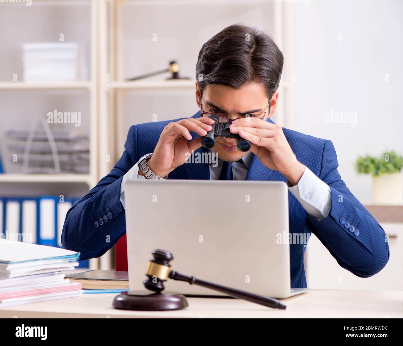 The young handsome judge working in court Stock Photo - Alamy