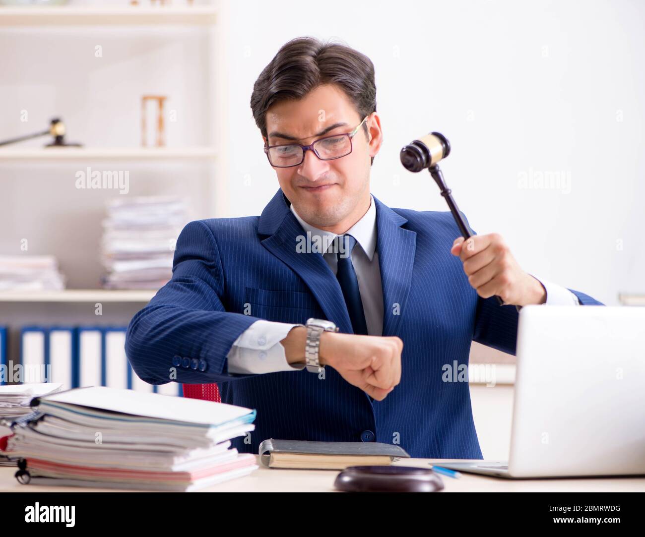 The young handsome judge working in court Stock Photo - Alamy