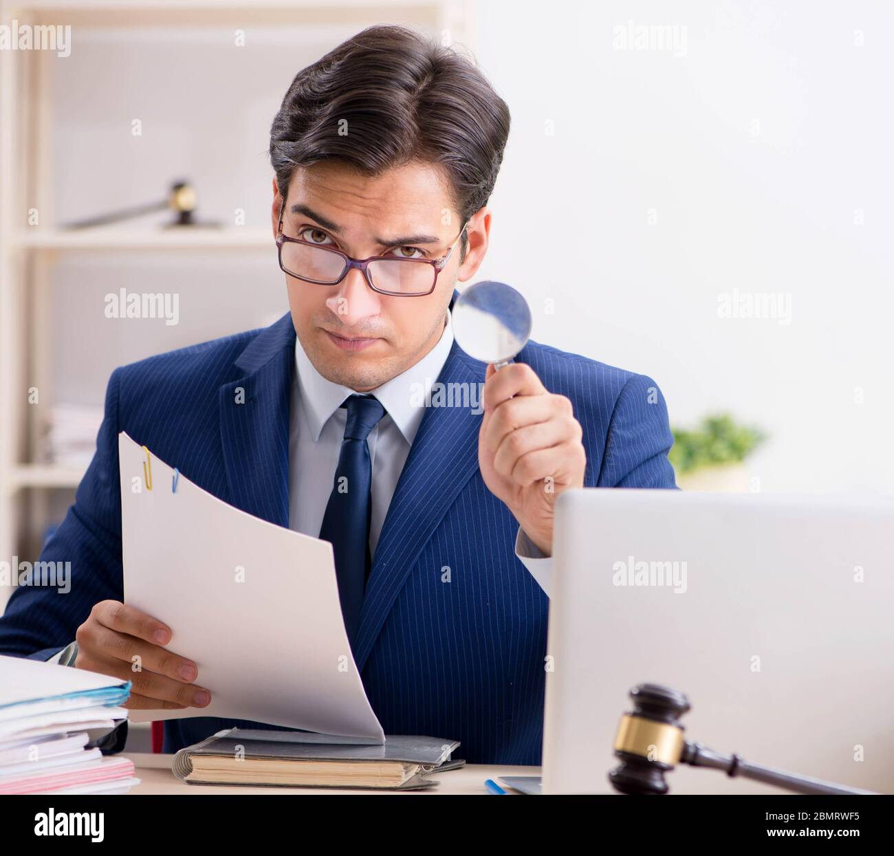 The young handsome judge working in court Stock Photo - Alamy