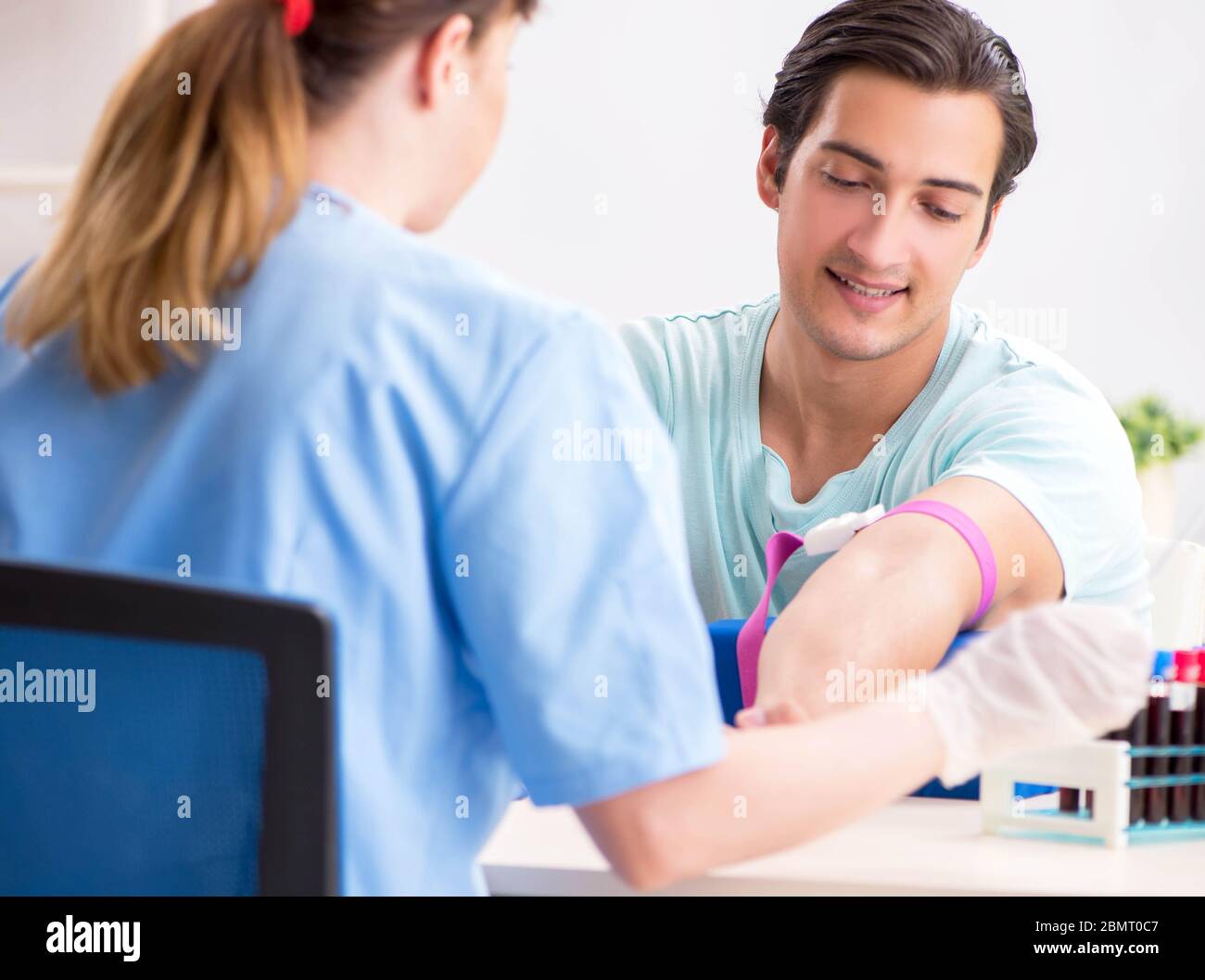 The young patient during blood test sampling procedure Stock Photo - Alamy