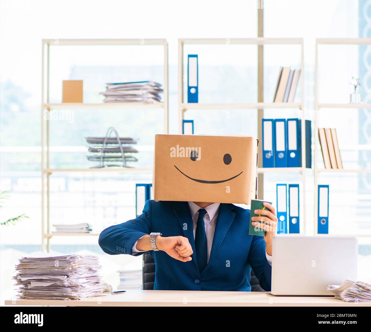 The happy man with box instead of his head Stock Photo - Alamy