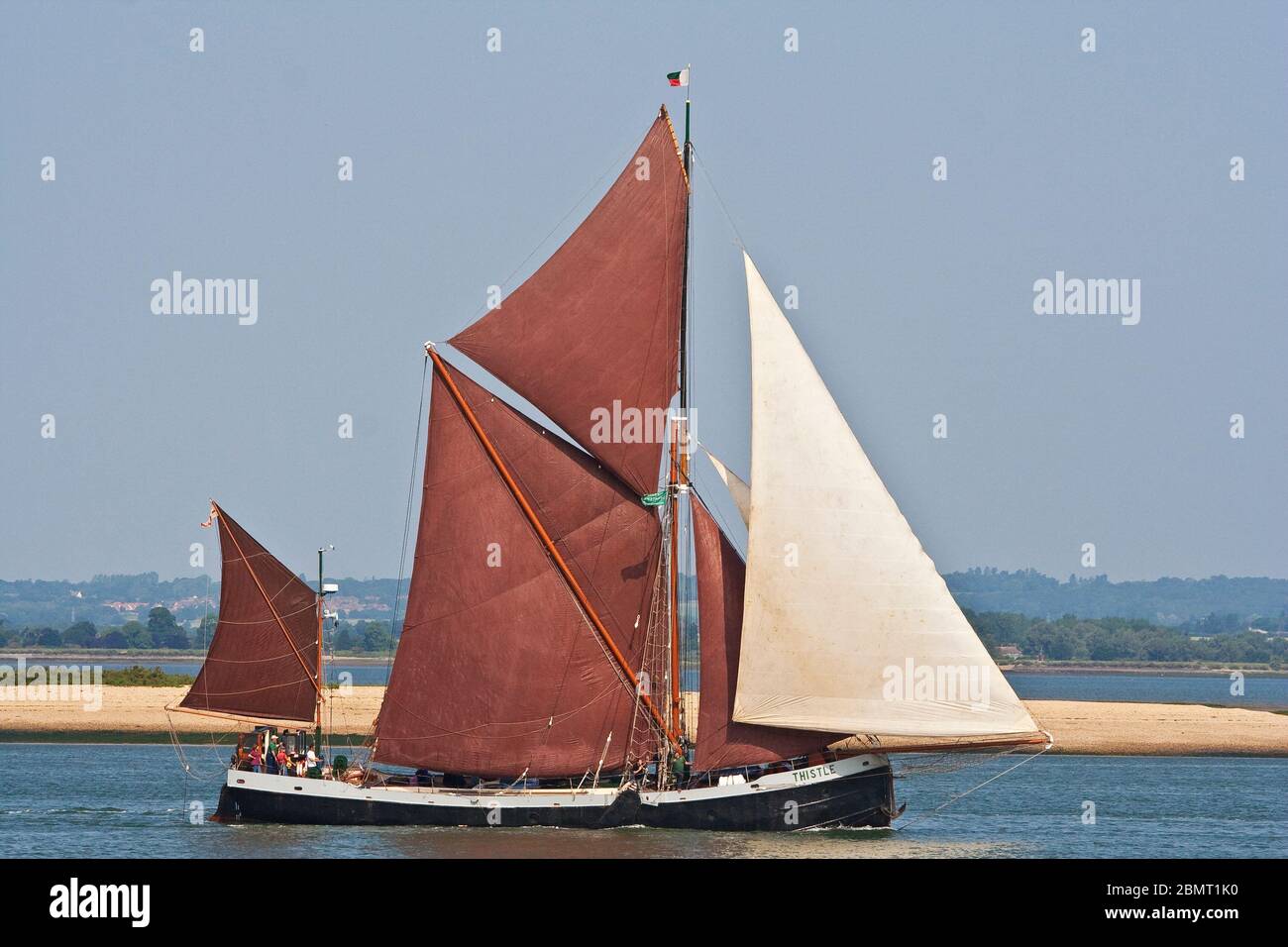 The Thames sailing barge Thistle in full sail Stock Photo - Alamy