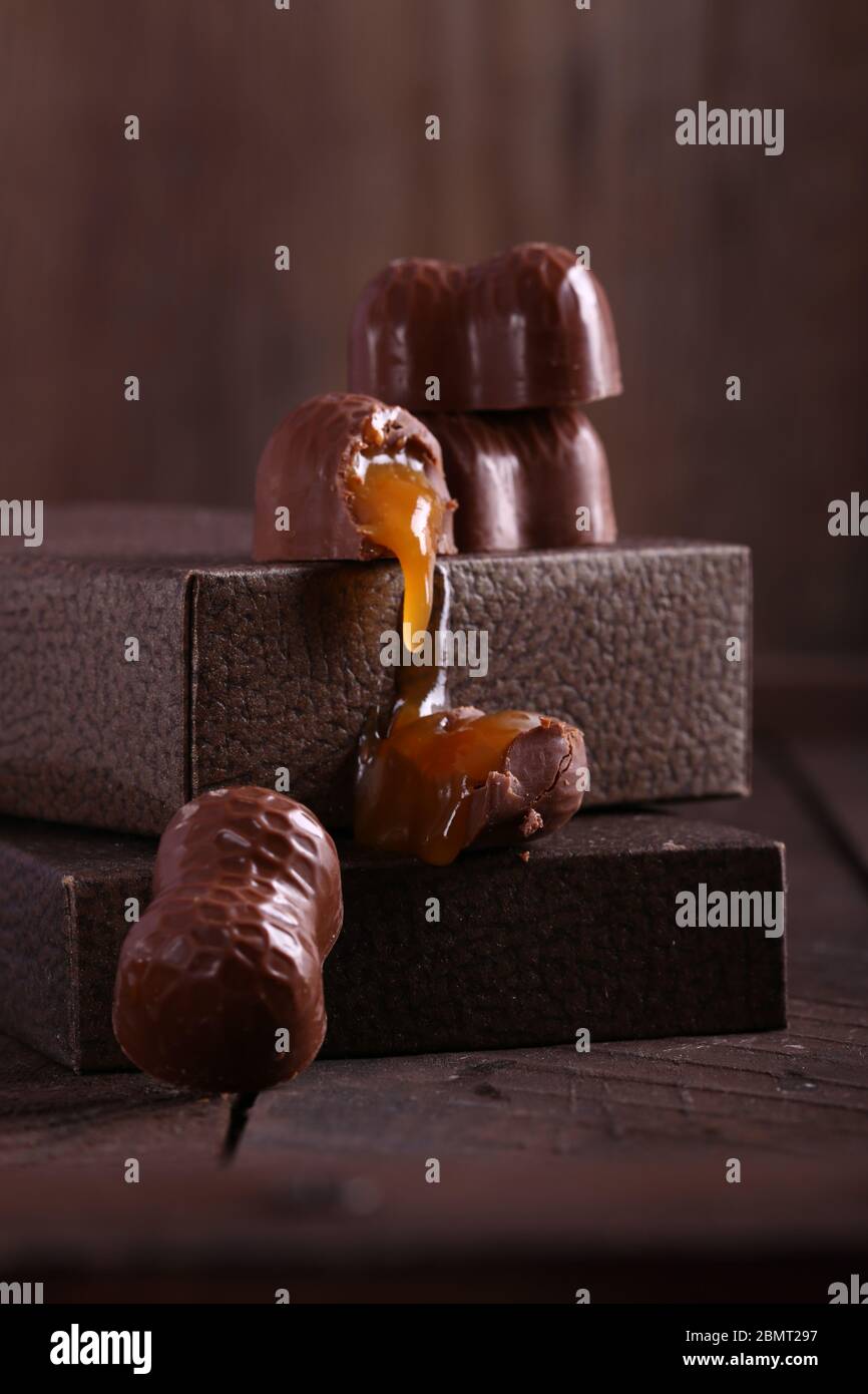 chocolate candies pralines with caramel Stock Photo - Alamy