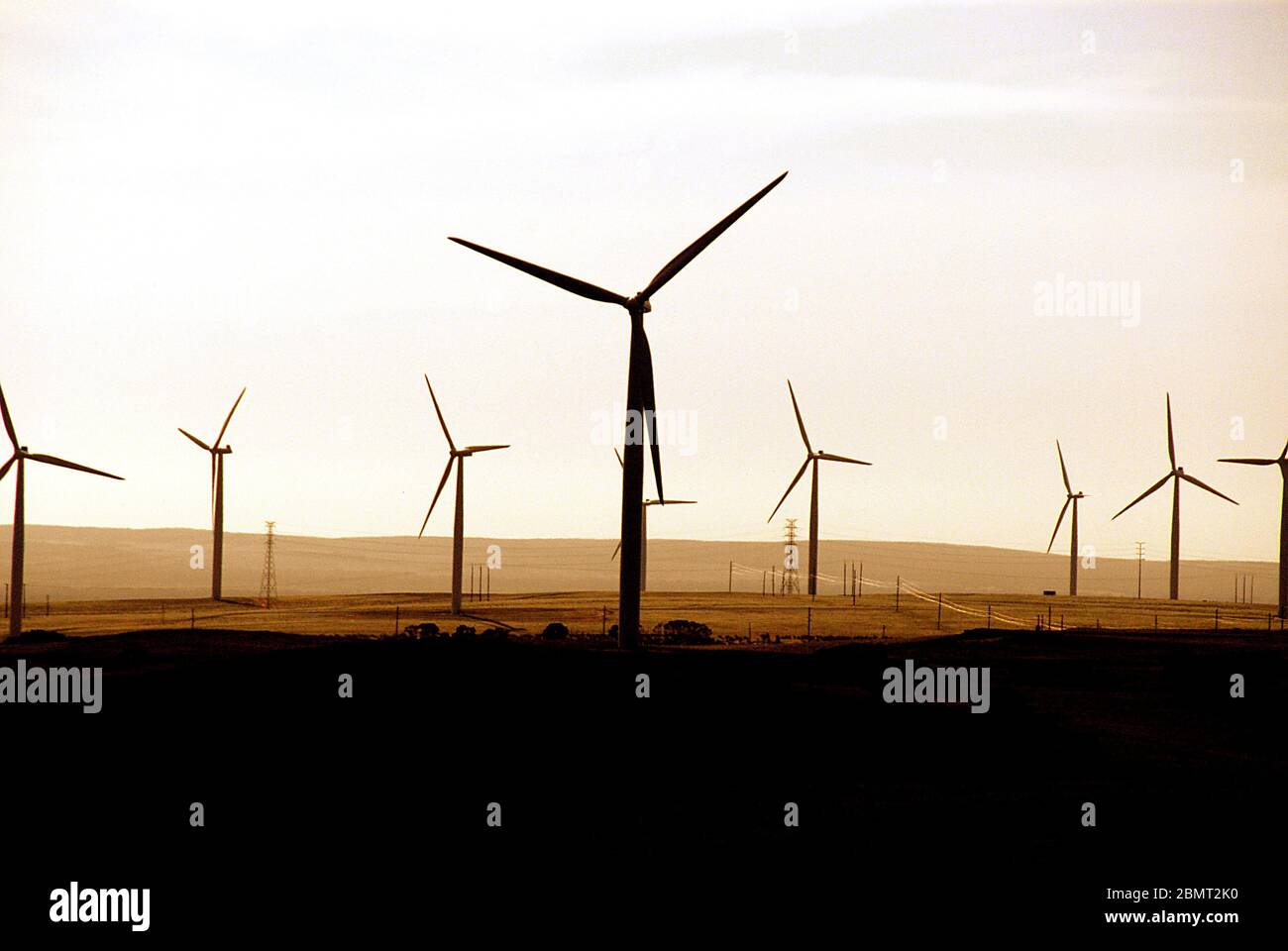 Close up views of wind turbines at sunset Stock Photo - Alamy