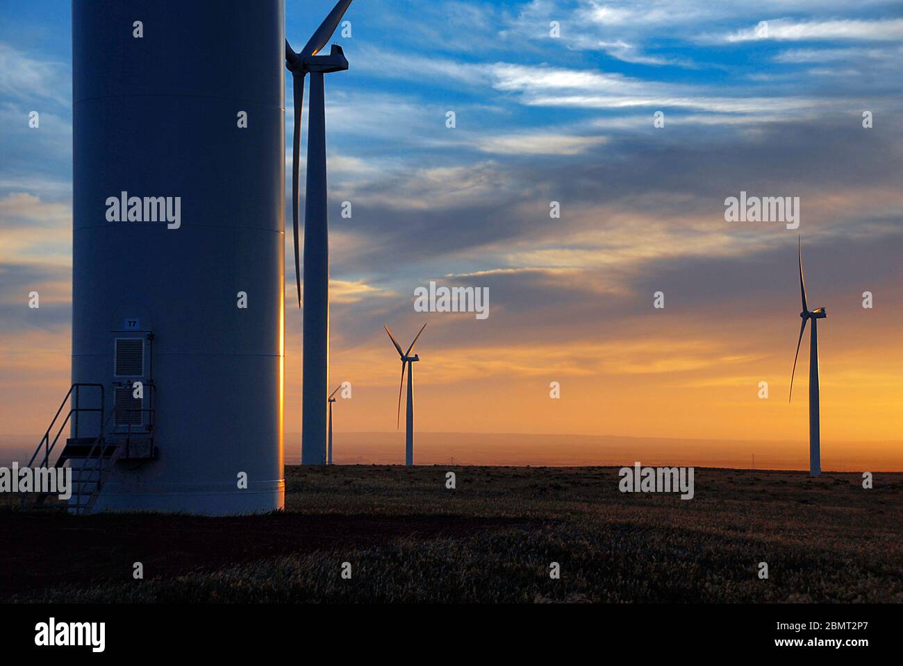 Close up views of wind turbines at sunset Stock Photo - Alamy