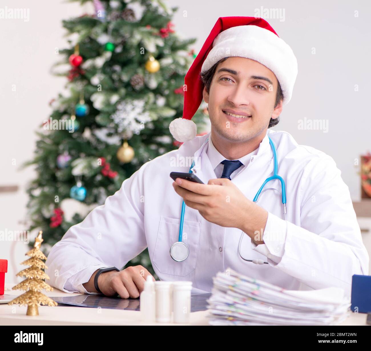 The doctor on the shift on christmas eve Stock Photo - Alamy