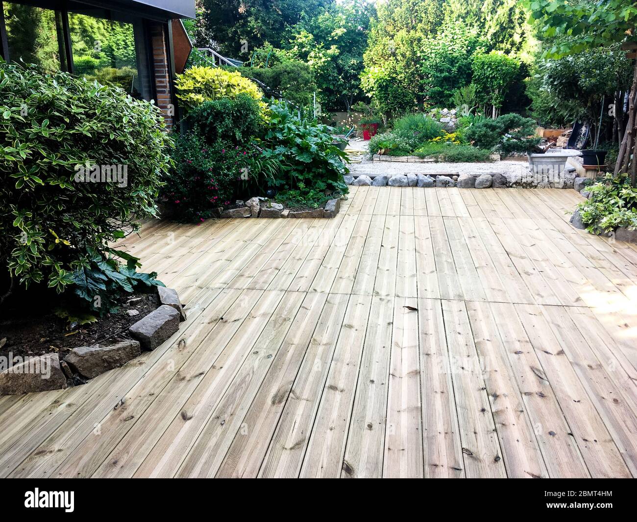 Wooden terrace in the garden of a private house Bron, France Stock ...