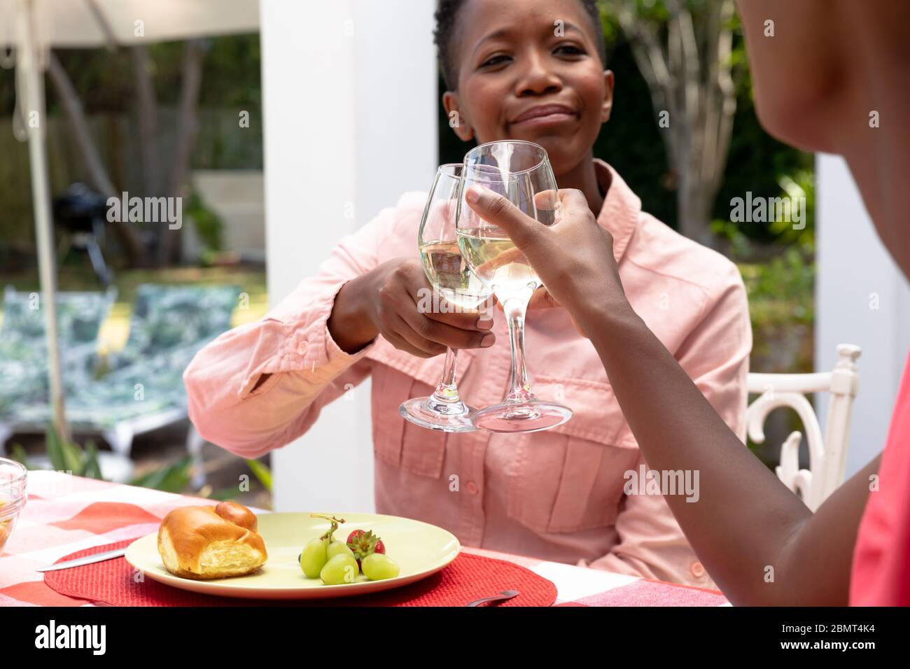 Three people making a toast hi-res stock photography and images - Alamy