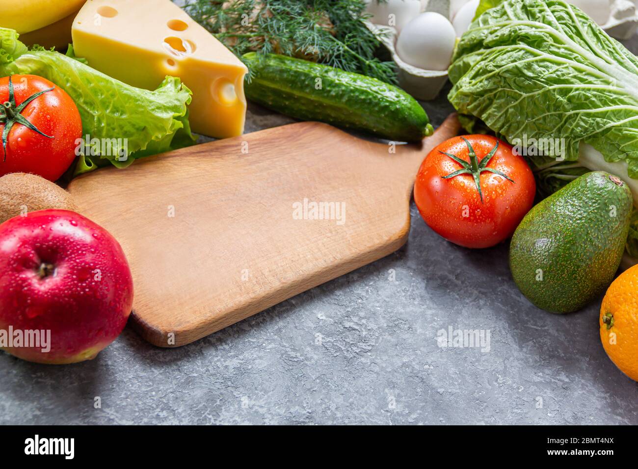 Conceptual image of a balance of healthy food with vegetables and ...