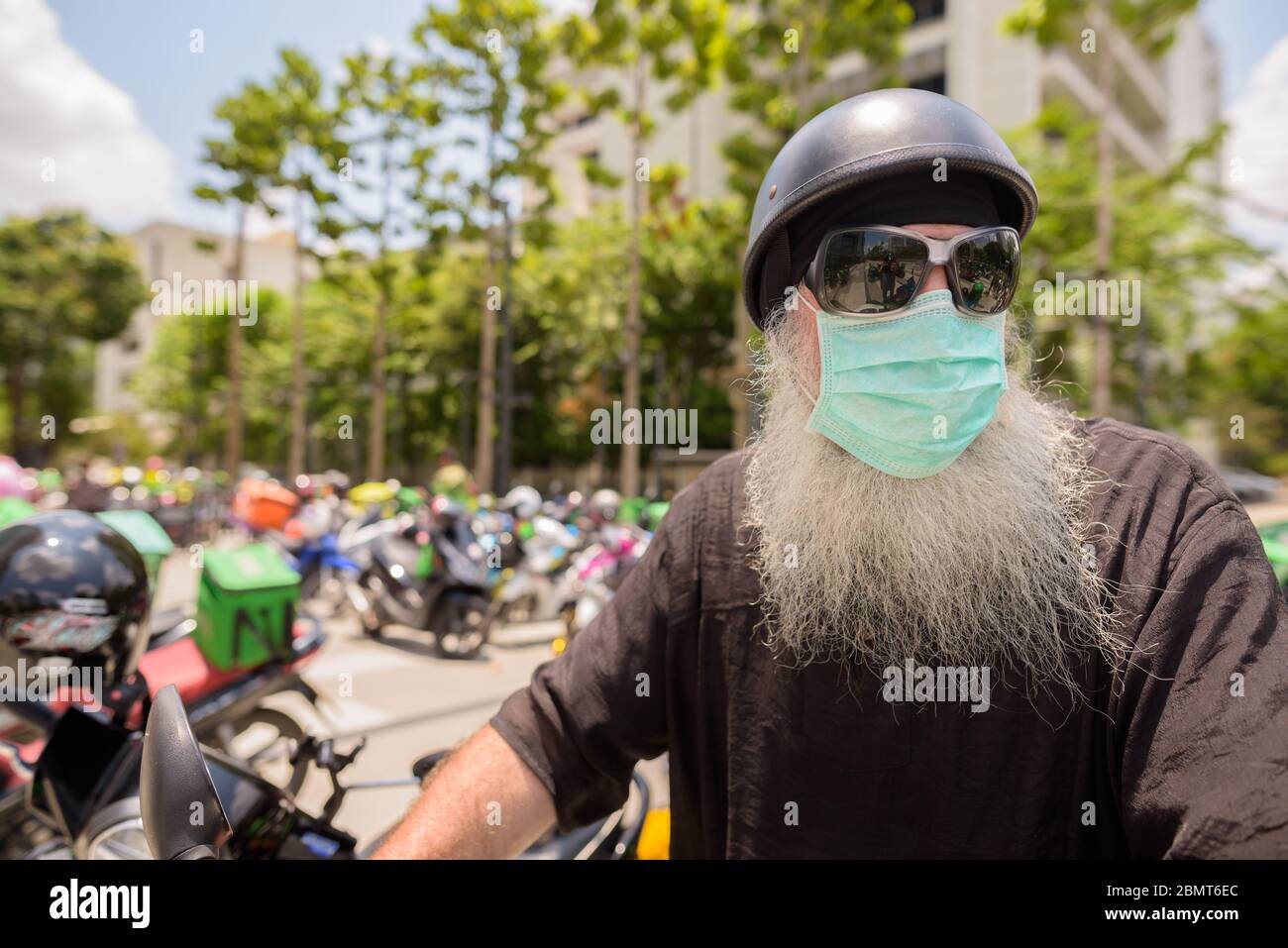 Motorcycle bangkok thailand mask hi-res stock photography and images ...