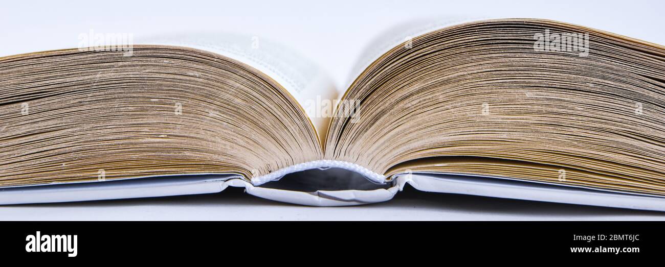 Closeup of a hardcover book open in the middle, Open book Stock Photo ...
