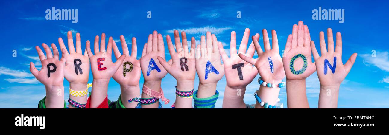 Kids Hands Holding Word Preparation, Blue Sky Stock Photo - Alamy