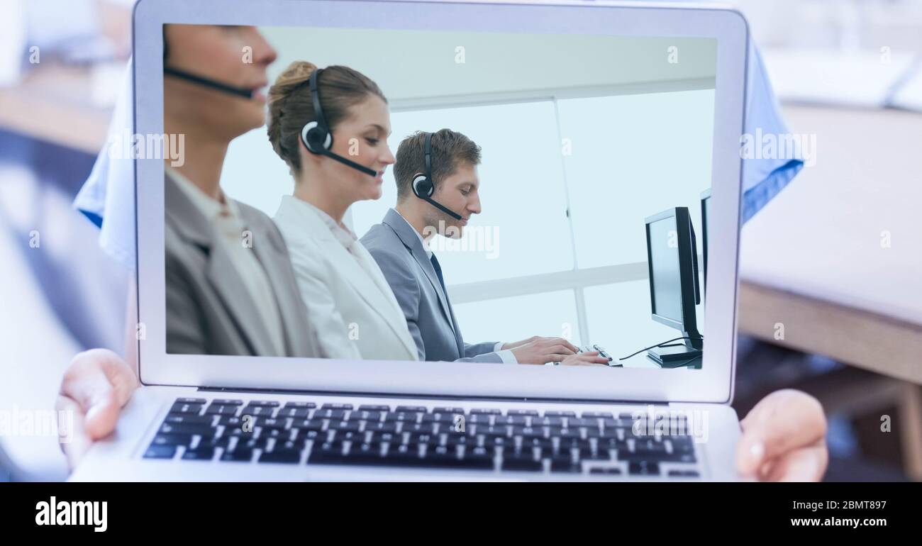 People working on laptop screen Stock Photo - Alamy