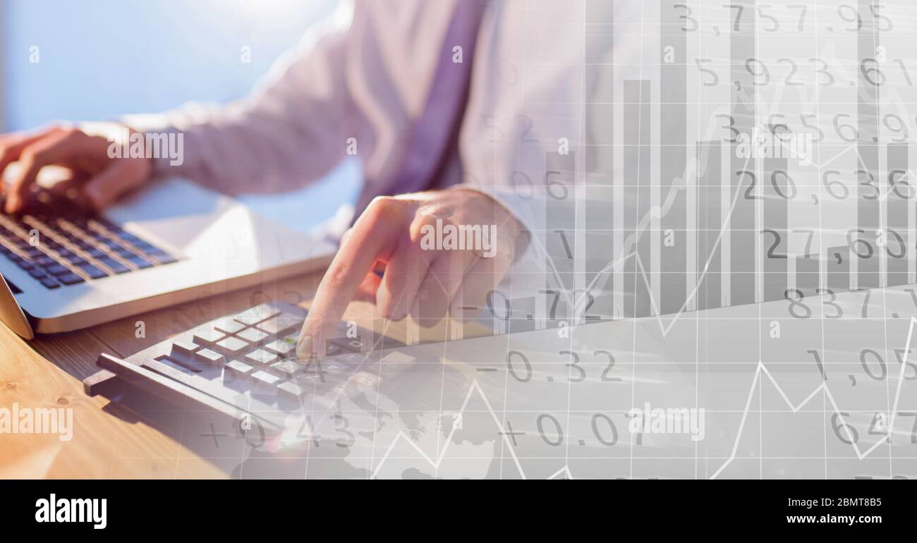 Caucasian male hands calculating over statistics Stock Photo - Alamy